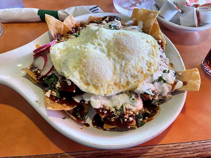 Chilaquiles that bring authentic Mexican breakfast tradition to your table with colors as vibrant as a desert sunrise.