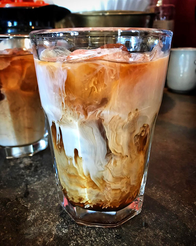 Coffee art that doesn't need a filter. This swirling iced creation looks like the caffeinated version of a lava lamp, and probably tastes twice as good.