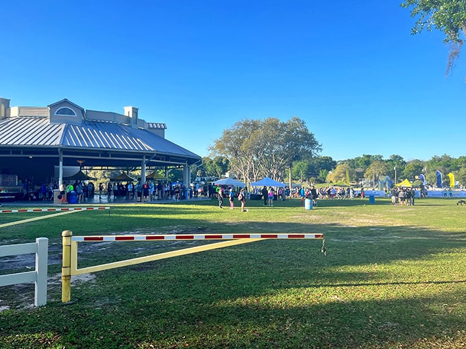 Community events bring residents together under pavilions and blue skies, where conversations matter more than costly entertainment.