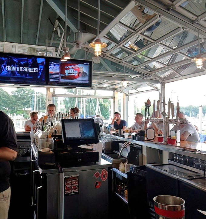 Where maritime meets modern – the bar area balances nautical charm with enough TVs to keep you updated on the Orioles game.