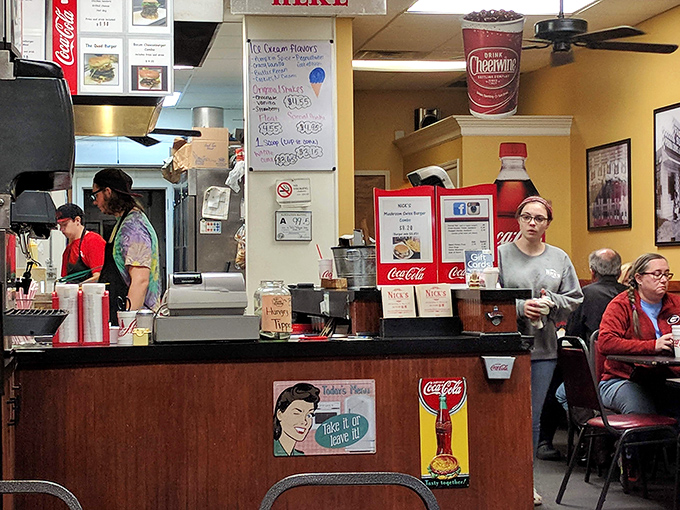 At the counter, where regulars exchange news while staff orchestrate the delicious chaos with the precision of veteran conductors.