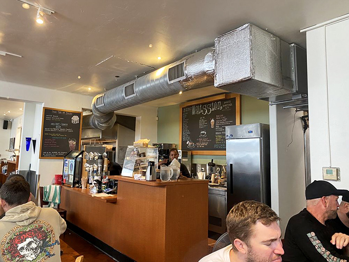 The beating heart of breakfast magic—where baristas orchestrate morning symphonies of espresso and servers choreograph the dance of delicious plates.
