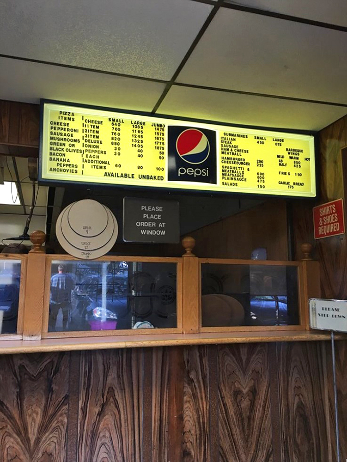 "PLEASE PLACE ORDER AT WINDOW" reads like poetry when you know culinary happiness awaits on the other side of that transaction. 