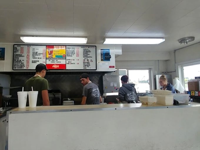 The counter where magic happens—a humble stage for a daily performance of American culinary classics that never go out of style.
