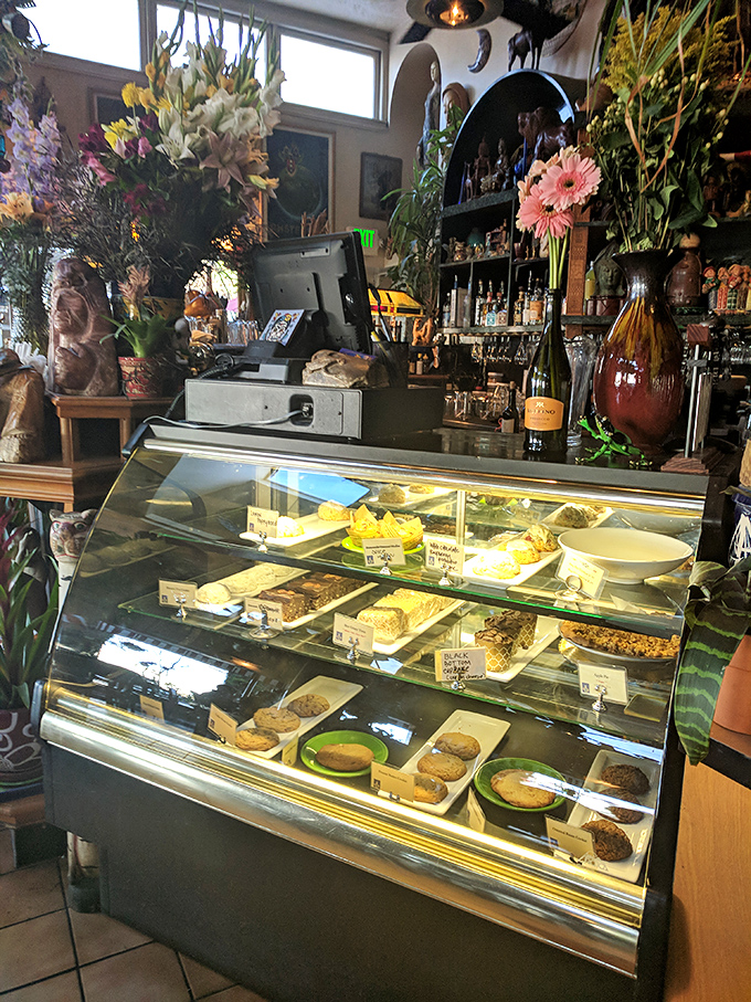 Sweet temptations behind glass—the dessert case at Tower Café offers the perfect excuse to linger longer after your Famous French Toast.
