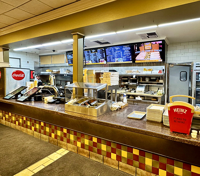The counter – hallowed ground where orders are placed and culinary dreams come true. Note the colorful tile work below.