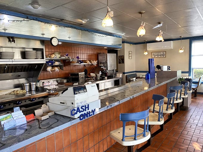 "Cash Only" declares the counter sign – a charming throwback to simpler times when breakfast didn't require a digital transaction.