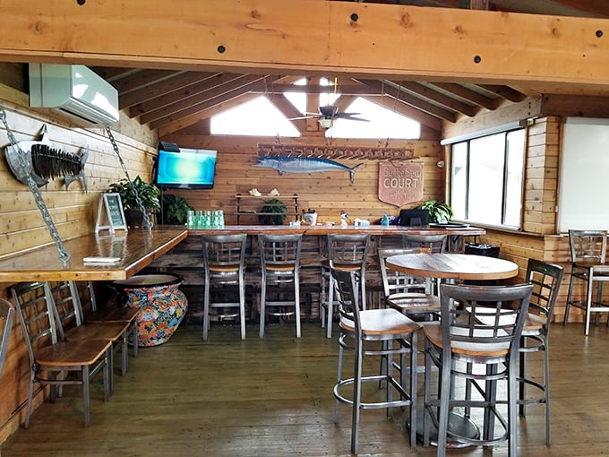High-top seating that says "stay awhile" – the perfect perch for people-watching while debating whether to order seconds or save room for pie.