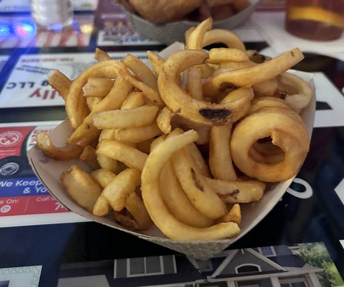 Curly fries that zigzag their way into your heart – crispy, seasoned spirals that make straight fries seem like they're not even trying.