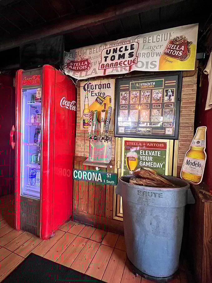 The vintage Coca-Cola machine and beer signs aren't calculated nostalgia—they're authentic pieces of a barbecue joint that knows exactly what it is.