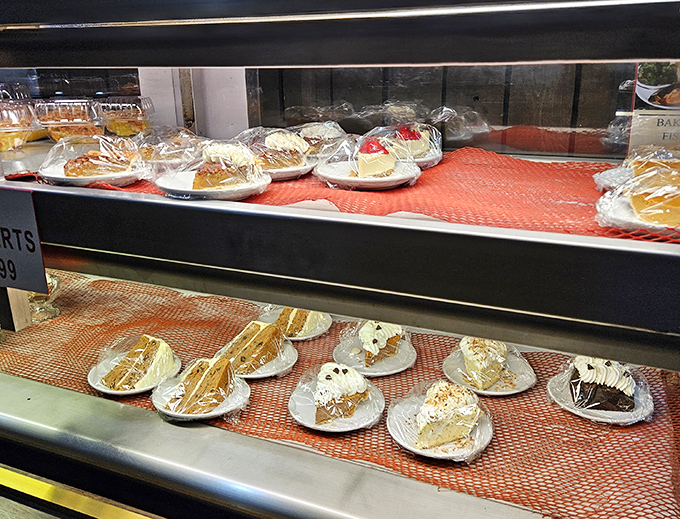 Dessert heaven awaits behind glass, where slices of cake and pie patiently wait their turn to provide the sweet finale to your York experience.