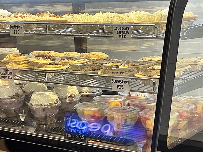 The dessert case that stops conversations mid-sentence and makes grown adults point like excited children.