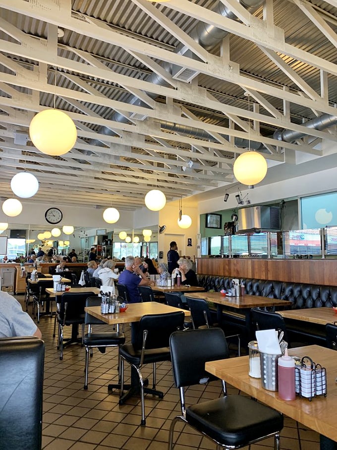 The bustling dining room where strangers become neighbors over plates of eggs and shared coffee refills—a true Los Angeles melting pot.
