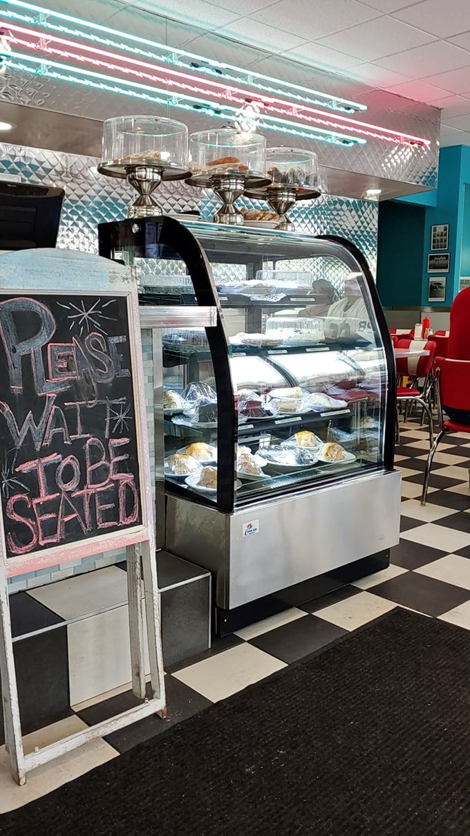 The dessert case – where willpower goes to die. Behind that curved glass lies temptations that make even the strongest resolve crumble.