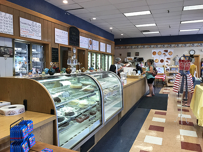 Display cases filled with temptation—each pie a work of art that somehow manages to taste even better than it looks.