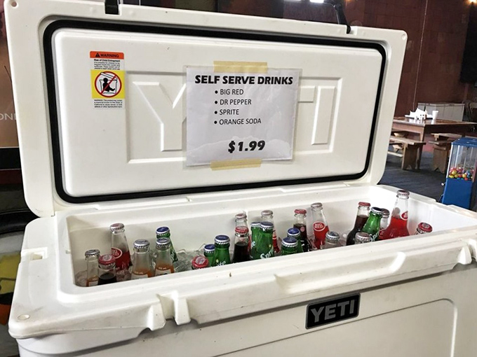 The drink cooler – because fighting the meat sweats requires proper hydration. That Big Red is calling your name.