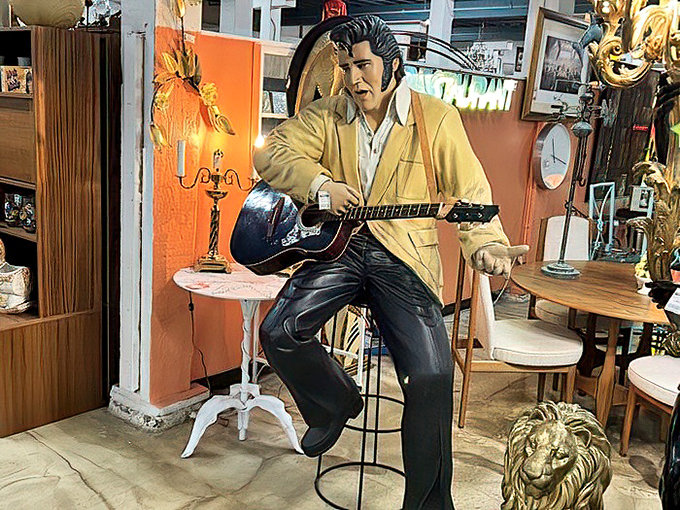 The King lives on in this life-sized Elvis figure, eternally ready to serenade your living room with "Blue Suede Shoes.