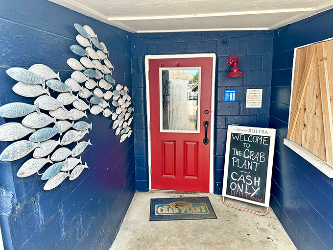The entrance sets the nautical mood with a school of metal fish that never needed water to swim. Cash only—just like the old days!
