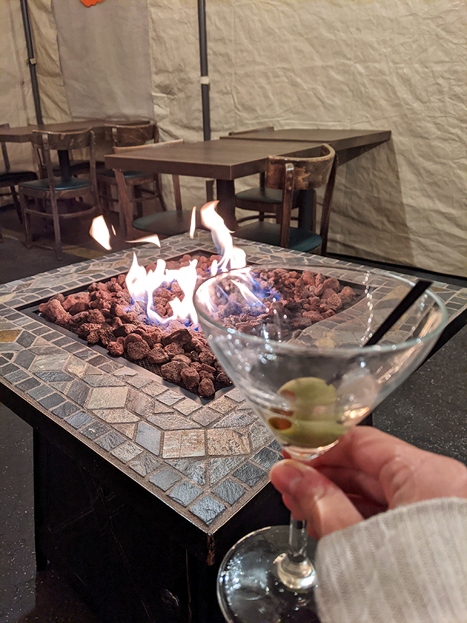 Fire, cocktails, and sea air – a combination that would make even Poseidon himself settle in for the evening.