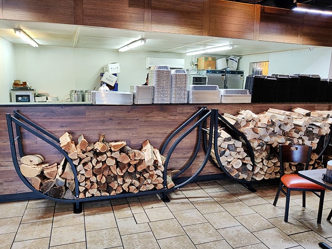 Stacked firewood isn't just decoration—it's a promise. Each log represents hours of slow-smoking magic that transforms ordinary meat into extraordinary memories.
