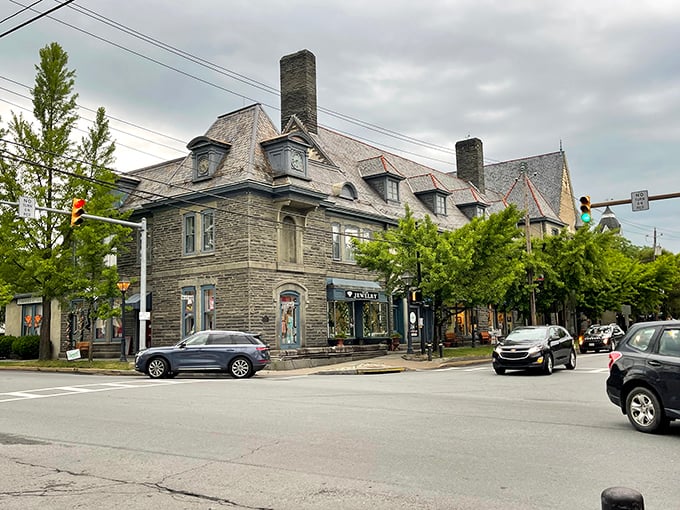 Forester's Hall anchors the corner with Pennsylvania bluestone dignity. These walls have witnessed more than a century of Milford's evolving story.