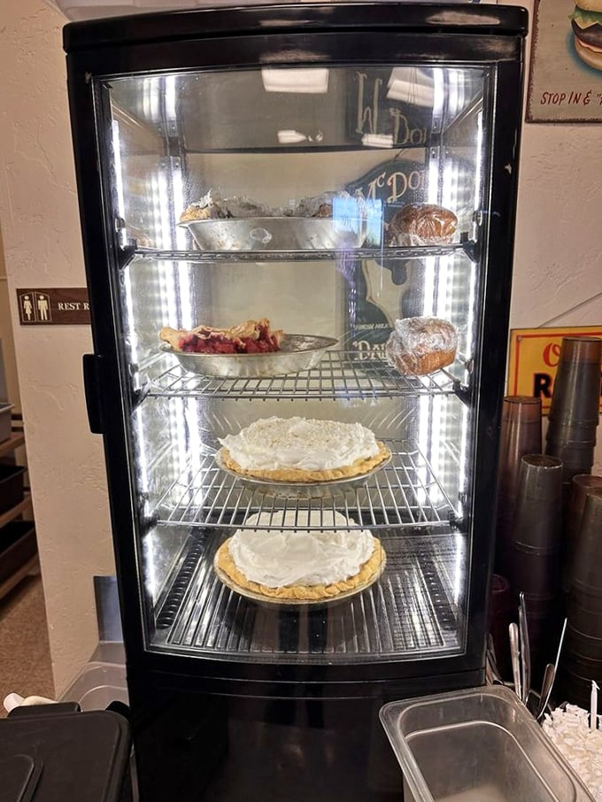 The dessert case—Arizona's version of the Louvre. Each shelf displays edible masterpieces that make you question why you'd ever save room for later.