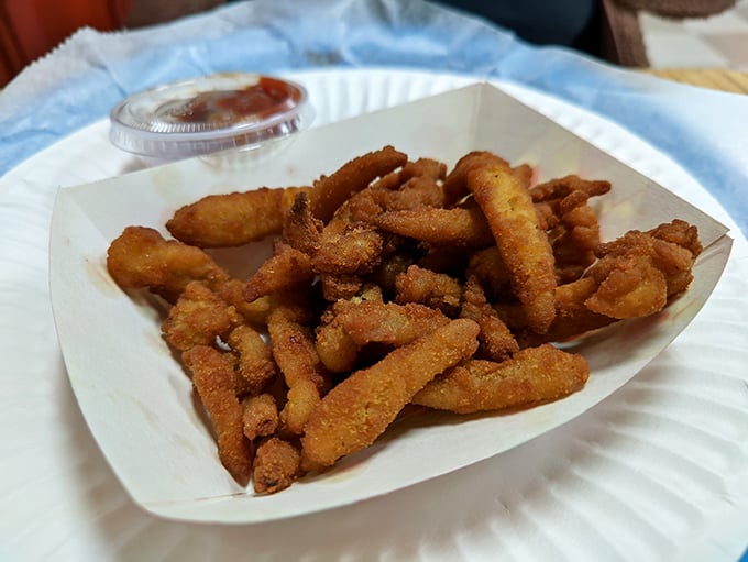 These fried oyster strips deliver that perfect ocean-meets-fryer alchemy that makes you forget you're miles from any coastline.