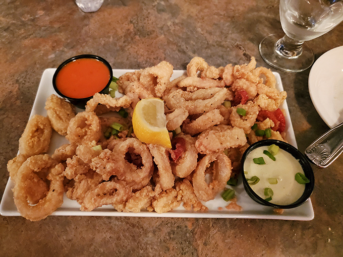 Fried calamari so perfectly golden and tender, it makes you wonder why anyone bothers with mozzarella sticks when this crispy treasure exists.