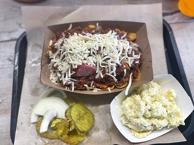 Frito pie—the beloved Texas snack that combines chips, meat, and cheese into something greater than the sum of its parts. Comfort food engineering at its finest.