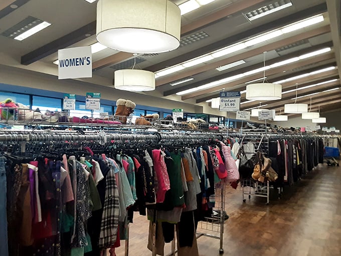 The women's clothing section stretches like a fashion runway of decades past. Somewhere in these racks is the vintage blazer you didn't know you needed.