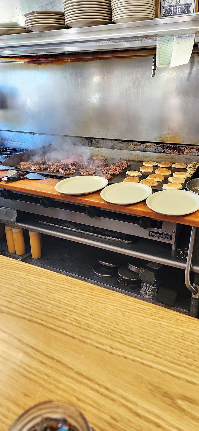 The grill – where breakfast dreams are born amid the symphonic sizzle of meat meeting heat in perfect harmony.