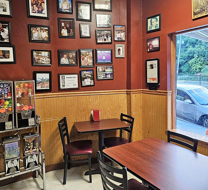 Red walls adorned with decades of memories tell stories that the menu can't—this isn't just a restaurant, it's a community archive.