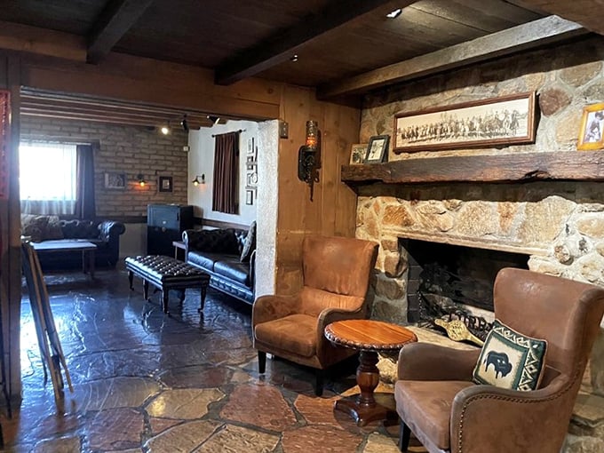 The lounge area with its stone fireplace offers the perfect spot to contemplate life's important questions, like "Should I order dessert?"