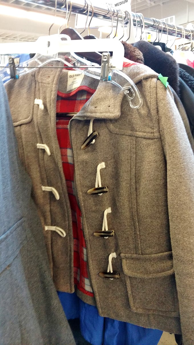 That toggle coat with plaid lining isn't just warm—it's practically a Portland citizenship card. Hipster approved since forever.