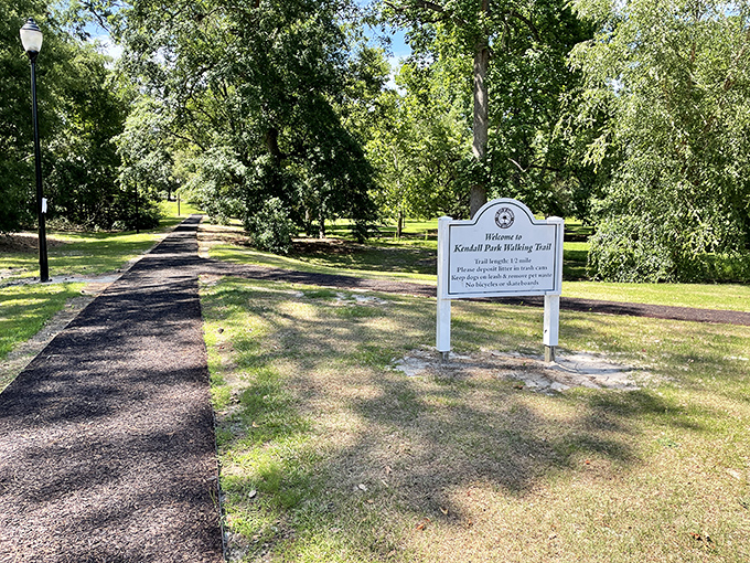 Kendall Park's walking trail invites visitors to stretch their legs while contemplating absolutely nothing important – pure bliss.
