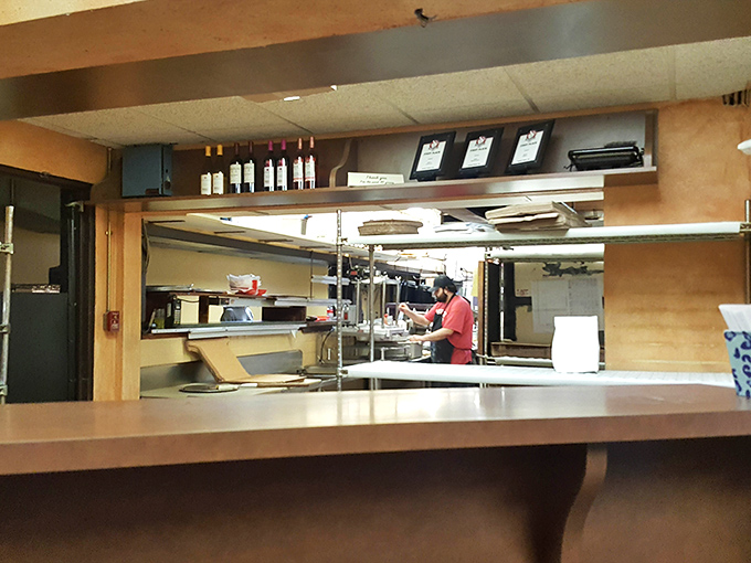 A glimpse into the kitchen reveals the heart of Lino's magic—where decades of tradition transform into the plates that keep generations returning.