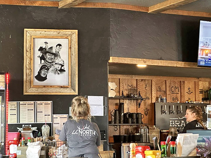 Even the kitchen area exudes rustic charm with western-inspired artwork. The staff moves with the choreographed precision of breakfast ninjas.
