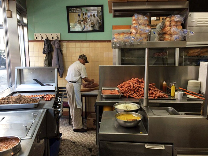 Where the magic happens! Hot dogs lined up like soldiers awaiting their delicious destiny in this no-nonsense kitchen.