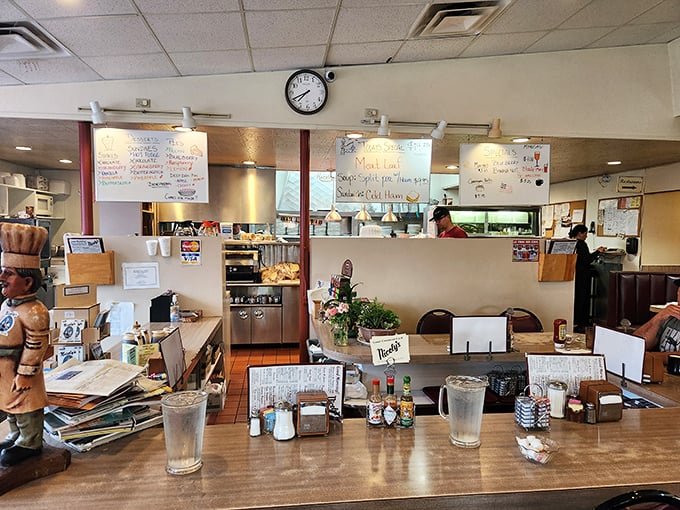 Where diner magic happens—handwritten specials on whiteboards and that counter where solo travelers never really dine alone.