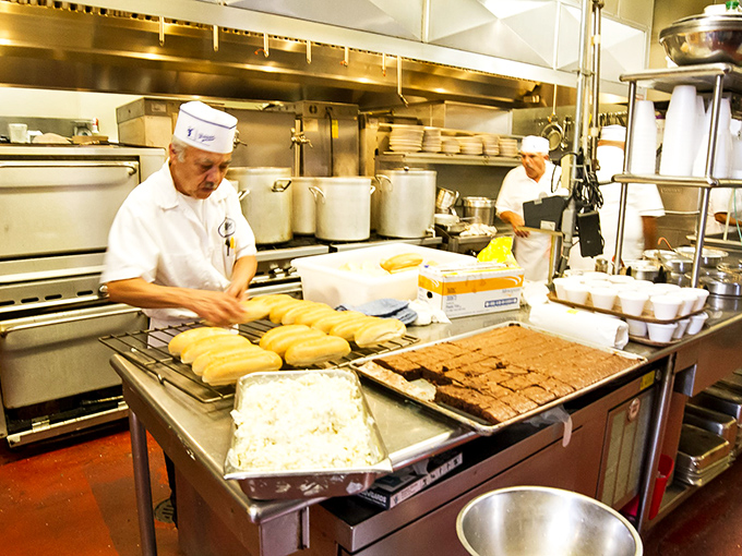 Behind the scenes where sandwich magic happens – those bakers work harder than my smartphone.