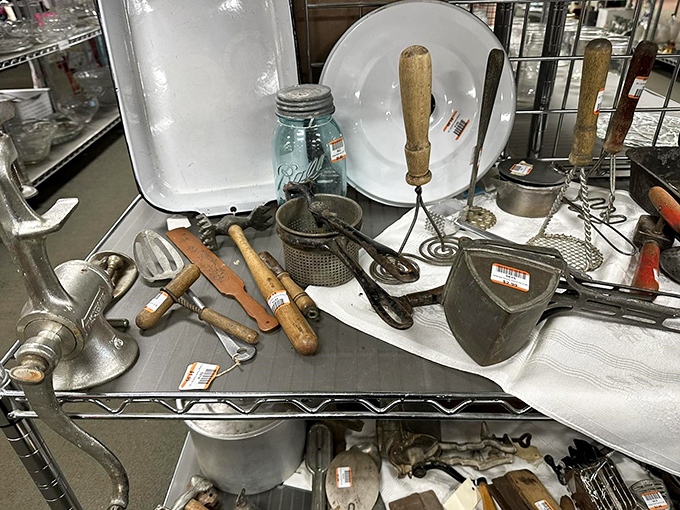 Kitchen tools with history—that meat grinder probably made someone's legendary meatballs before finding its way to this metal menagerie.
