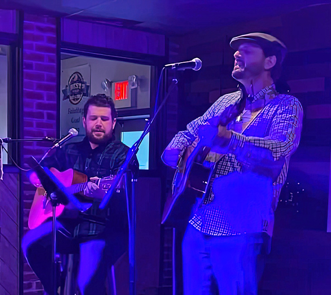 Live music transforms dinner into an experience—these guys aren't just playing songs, they're providing the soundtrack to your pretzel pilgrimage.