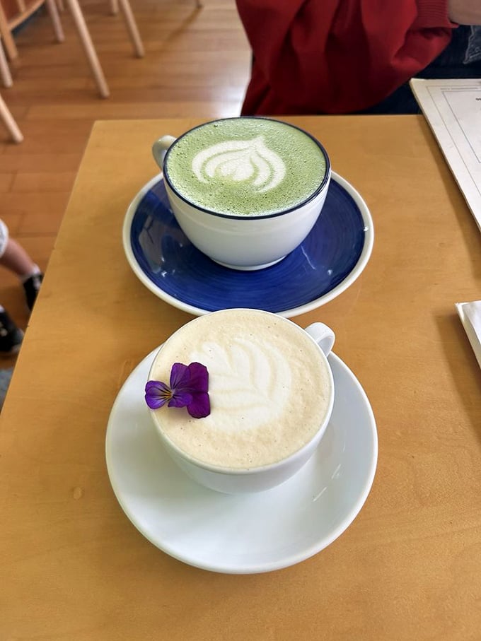 These aren't just beverages—they're works of art. The matcha's emerald swirl and the latte's delicate flower garnish elevate morning caffeine to ceremony.