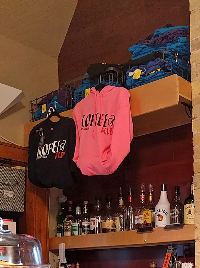 Even the merchandise knows this place is special – those hoodies aren't just clothing, they're wearable membership cards to the Koffee Kup club.