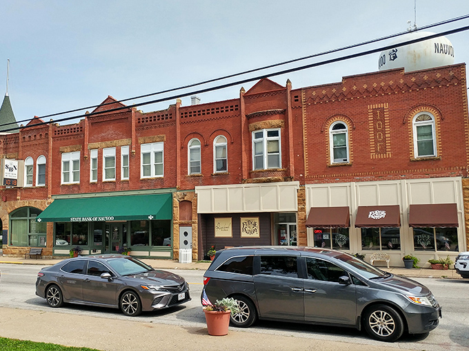Mulholland Street's historic storefronts create a living museum where modern cars park alongside buildings that have witnessed nearly two centuries of American life.