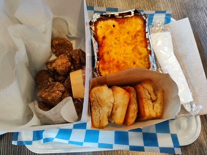 The holy trinity of comfort: mushroom nuggets, mac and cheese, and biscuits—a trio that could make even bad news bearable.