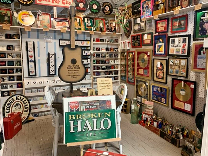 A music lover's paradise where vinyl records and gold albums create a timeline of American culture. That guitar has definitely played "Free Bird" at least once.