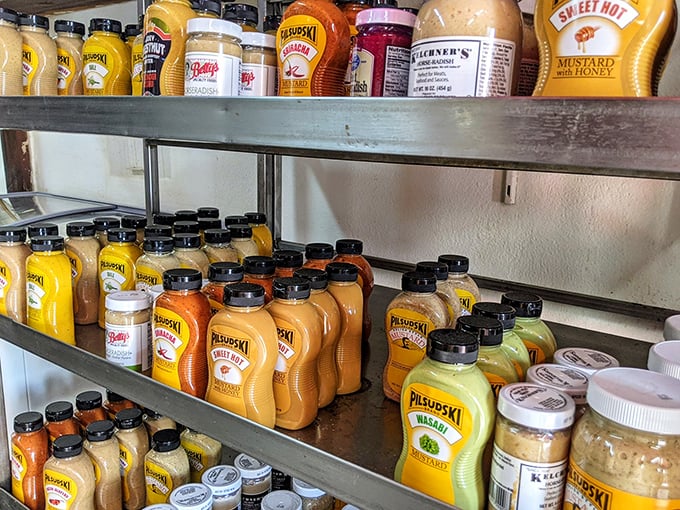 The mustard shelf isn't just condiments—it's a color palette of tangy possibilities, each bottle promising to elevate your kielbasa experience.