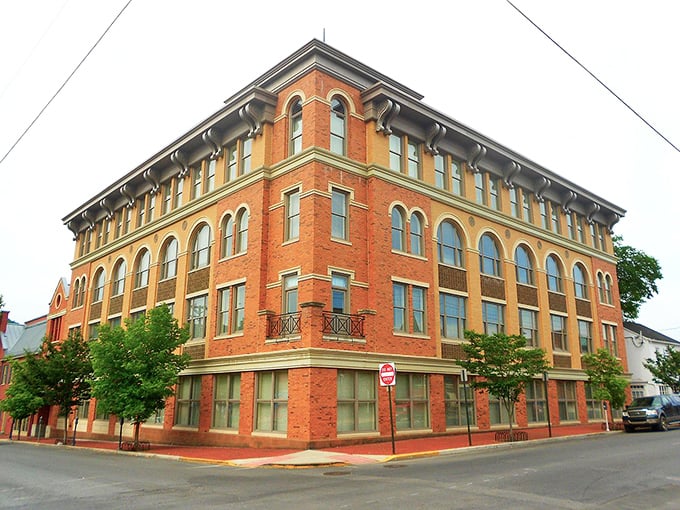 The Mutual Benefit Building stands as Huntingdon's architectural grande dame, her ornate brick façade and arched windows hinting at more elegant times.