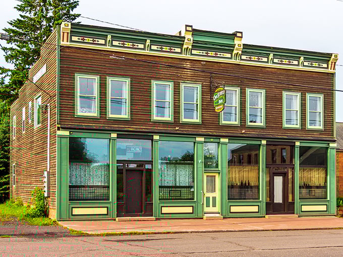 The Oak Street Inn's wooden façade and green trim channel a time when buildings dressed better than most people do for weddings today.